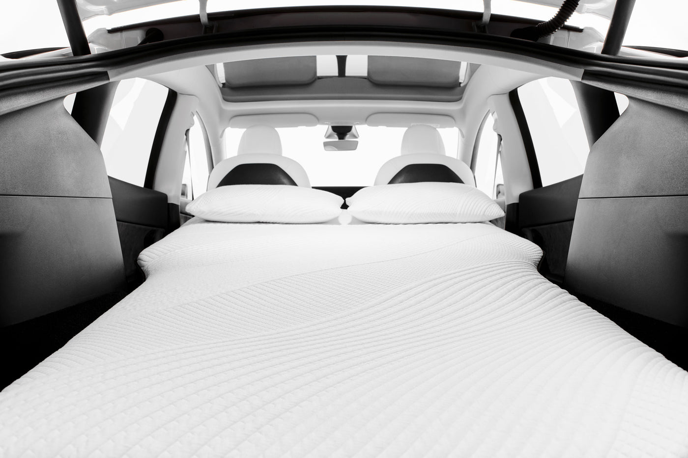 Tesla Bed | Sleep Comfortably in Your Tesla | Snuuzu